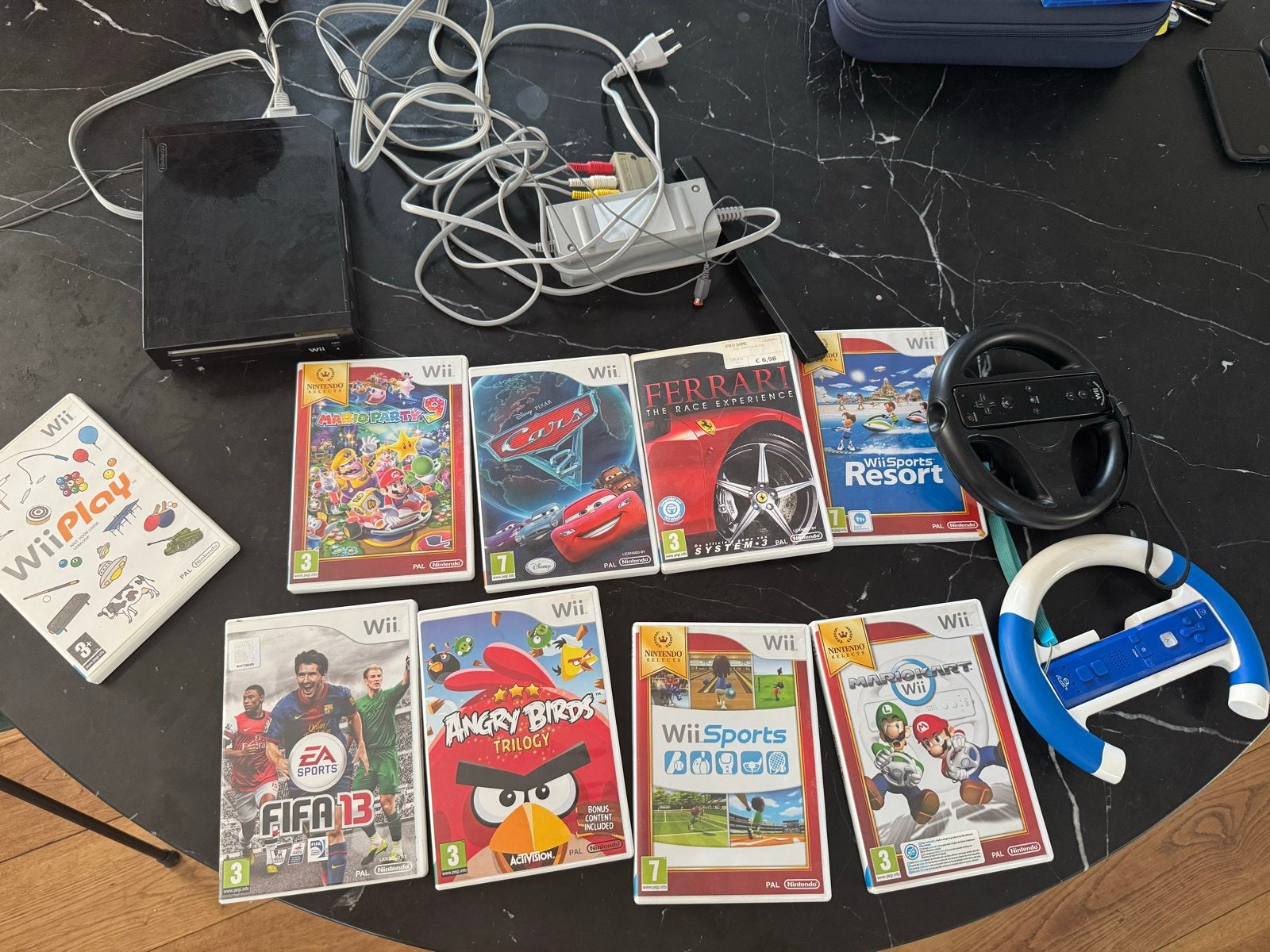 ≥ Nintendo Wii Console met 2 sturen en 8 games — Spelcomputers ...