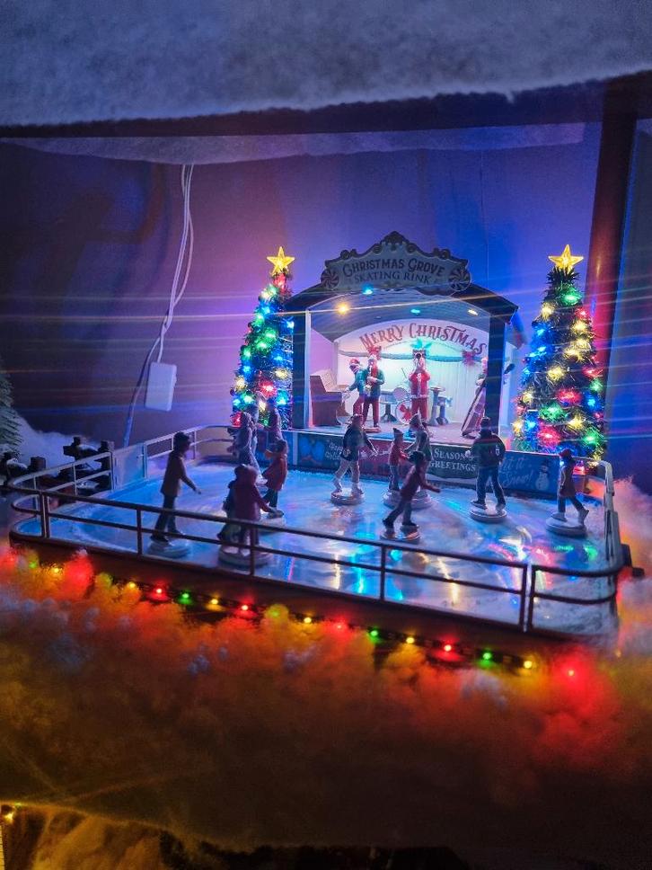 ≥ Lemax schaatsbaan, kinderkoor en vuurtoren — Kerst — Marktplaats